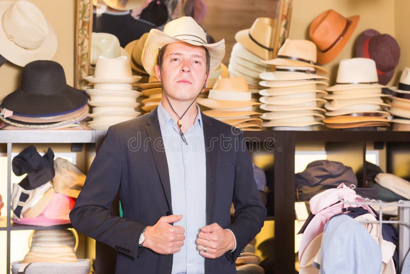 Portrait of Glad Male Try on Hat Stock Photo - Image of headwear ...