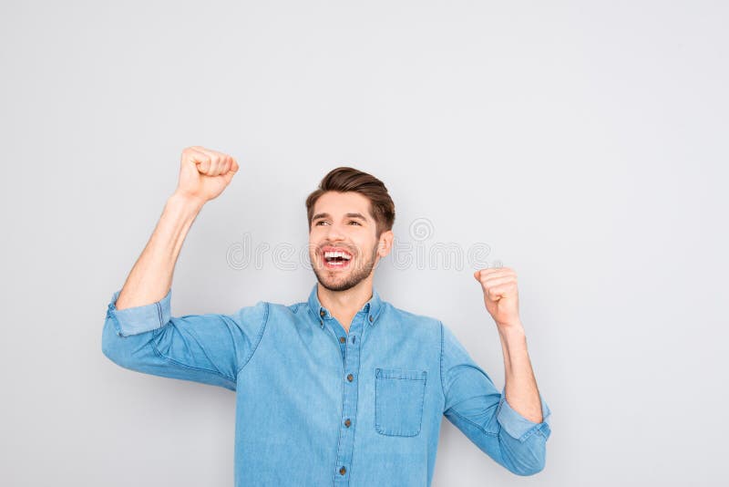 Portrait of Glad Man Celebrating Victory with Raised Hands Stock Photo ...