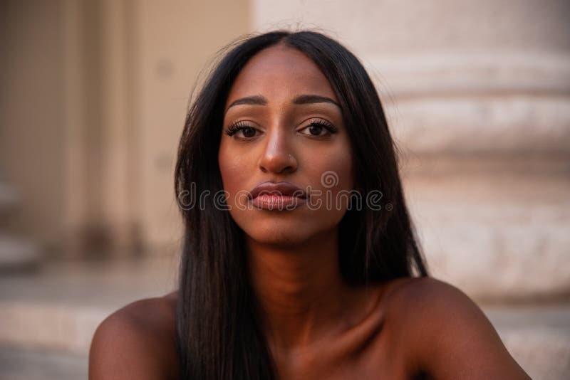Portrait of a Gorgeous Black Model Looking Thoughtfully Ahead of the ...