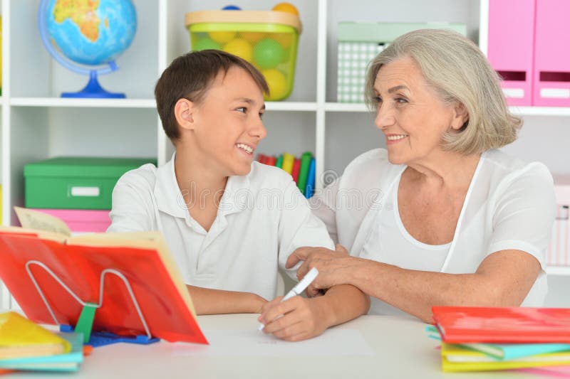 Portrait of Granny with Her Grandson Doing Homework Stock Photo - Image of globe, female: 207336508