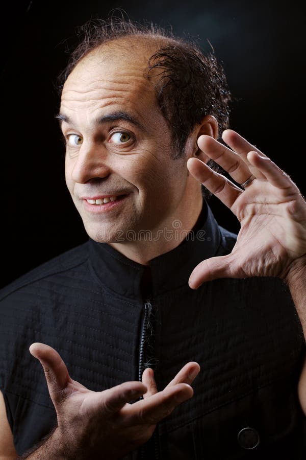 Portrait of Grimacing or Puckering or Grinning Man Stock Image - Image ...