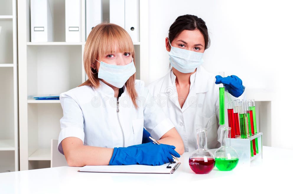 Portrait of group chemists stock photo. Image of adult - 27291772