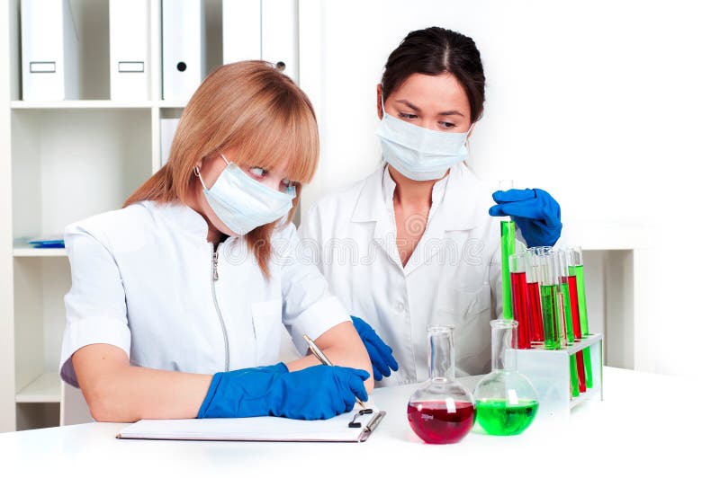 Portrait of group chemists stock image. Image of adult - 28536241