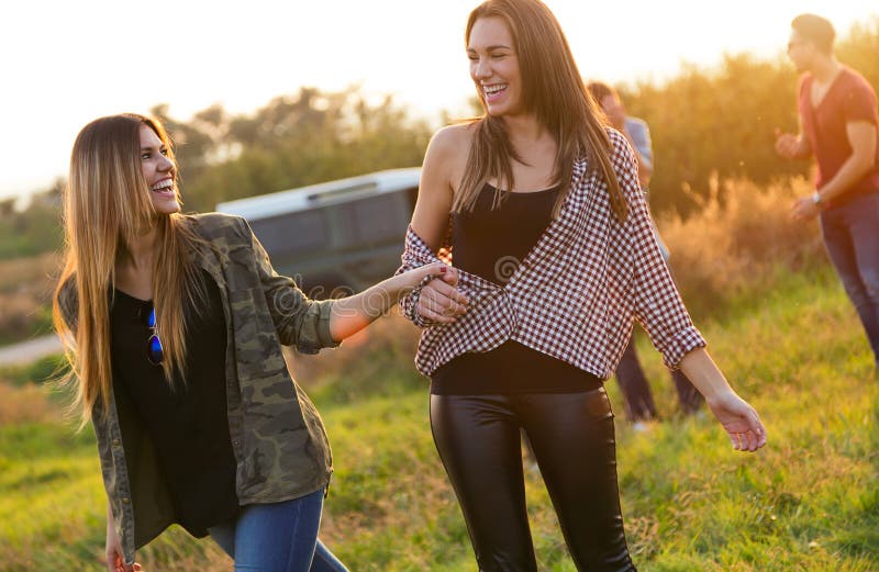 Portrait of Group of Friends Having Fun in Field. Stock Photo - Image ...