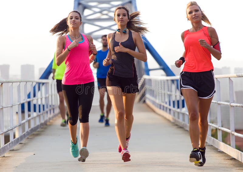 Portrait of Group of Friends Running in the Park. Stock Image - Image ...