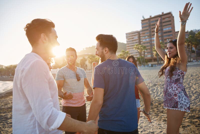 Group of Happy People Dancing on Beach Stock Image - Image of enjoy ...