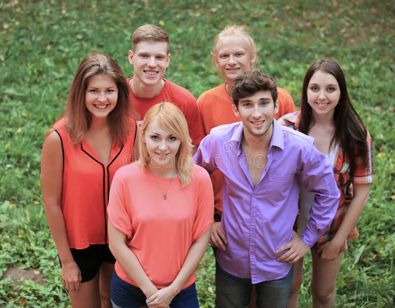 Portrait of a Group of Successful Young People on a Green Lawn Stock ...