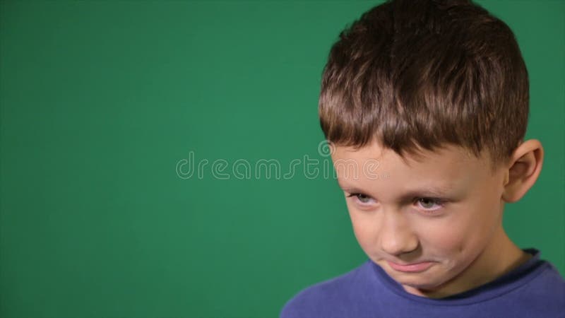 Portrait of the Guilty Boy, on a Green Background Stock Footage - Video ...