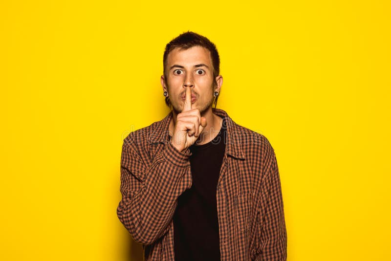 Man Making Silent Gesture with Finger on His Lips Stock Photo - Image ...