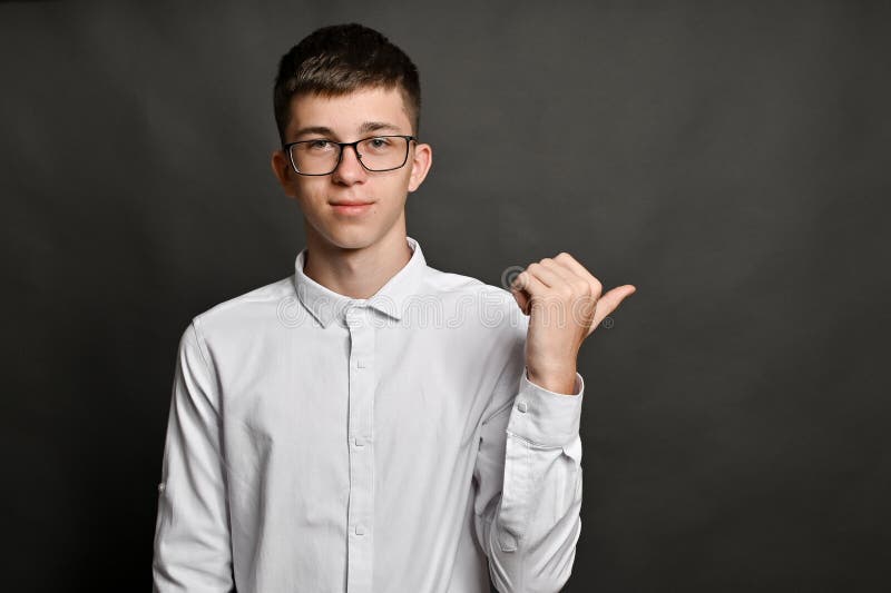 Portrait of a Guy Points His Thumb Back. Stock Image - Image of smile ...