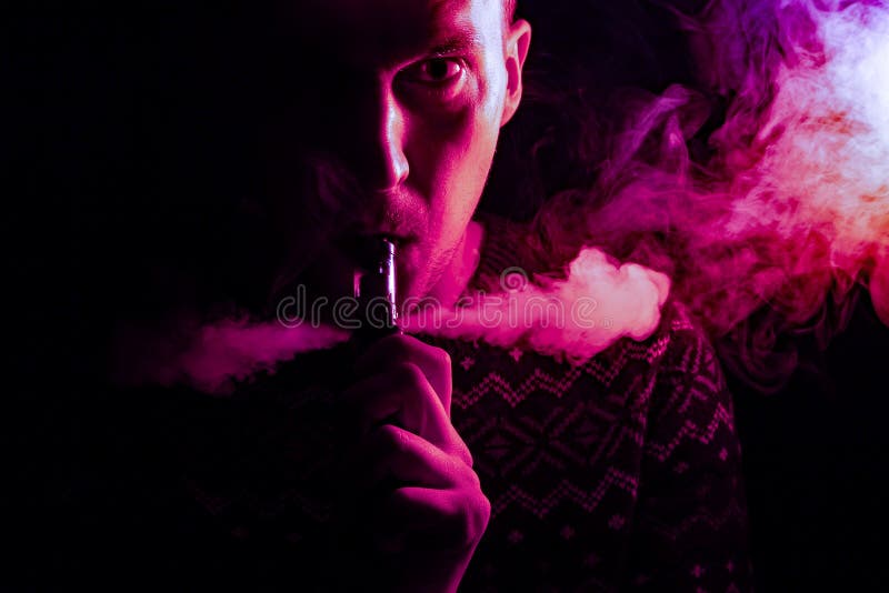 Portrait of a Guy with a Shadow on a Serious Face with a Colore Stock ...