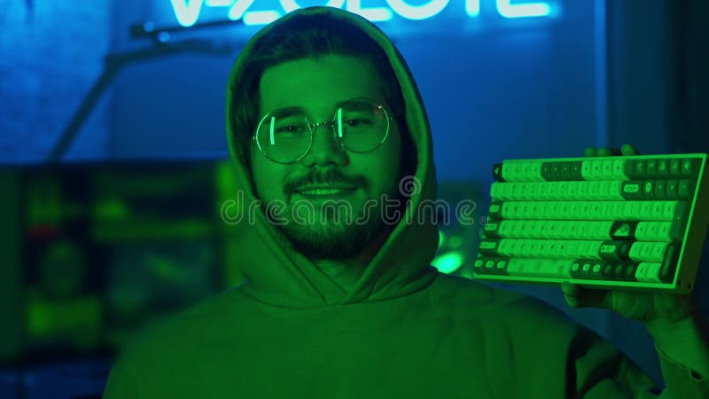 Portrait of a Programmer Looks Directly into the Camera, Illuminated by ...