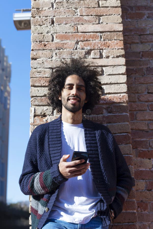 Portrait of Handsome Afro Man Using His Mobile in the Street Stock ...