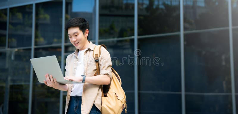 Portrait of Handsome Asian Student Using Computer Laptop Stock Photo ...