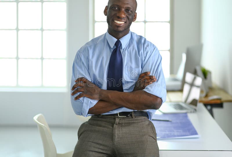 Portrait of an Handsome Black Businessman Standing in Office Stock ...