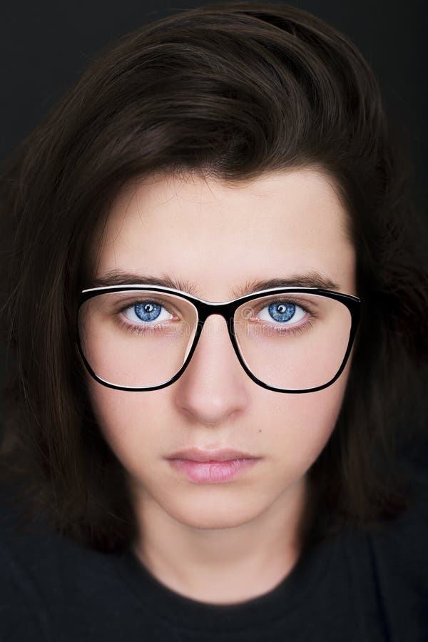 A Portrait of a Handsome Blue Eyes Teenager on Dark Background Stock ... A Portrait of a Handsome Blue Eyes Teenager on Dark Background Stock ...