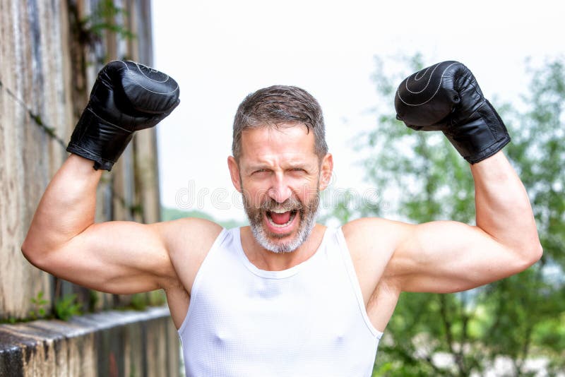 Boxer in Victory Pose in Front of Thunderbolt Stock Photo - Image of ...