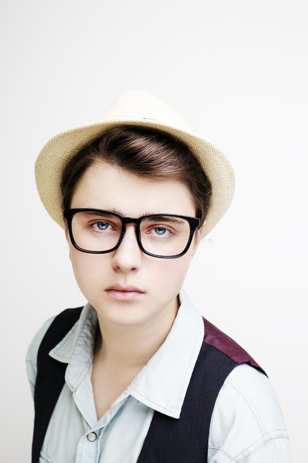 Handsome Boy with Eyeglasses and Hat Stock Photo - Image of pupil, face ...