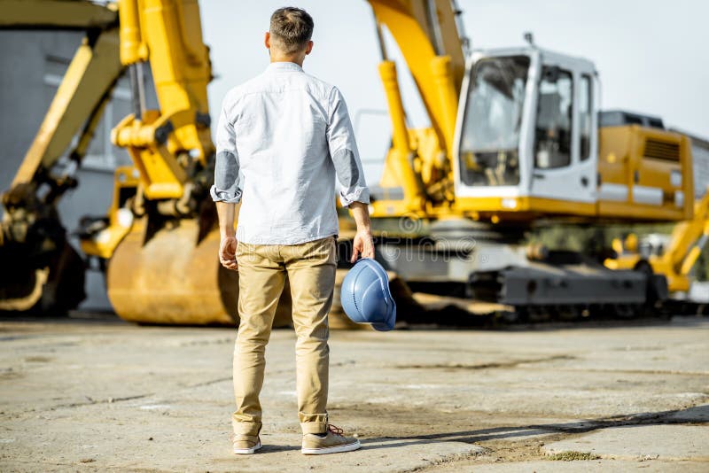 Builder at the Shop with Heavy Machinery Stock Image - Image of male ...