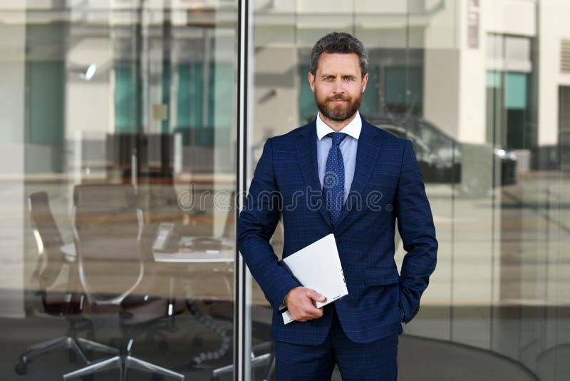 Portrait of Handsome Businessman Using Laptop Outdoor. Stock Photo ...