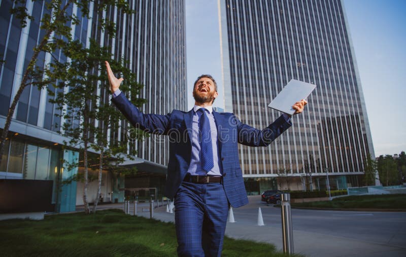Portrait of Handsome Businessman Using Laptop Outdoor. Stock Image ...