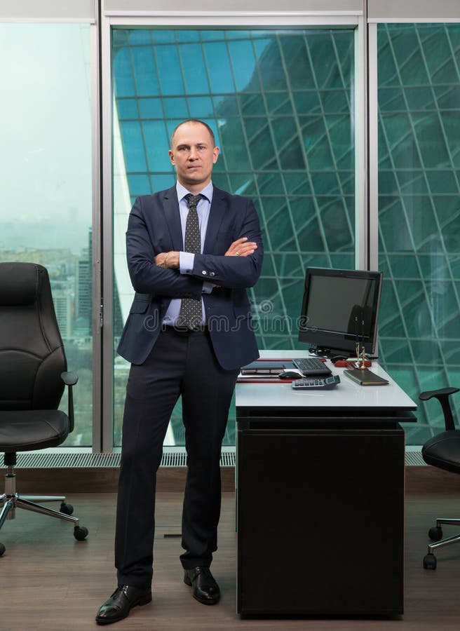 Portrait of a handsome CEO stock photo. Image of standing - 70464104