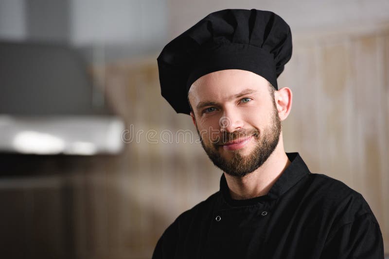 Portrait of Handsome Chef in Black Uniform Looking at Camera Stock ...