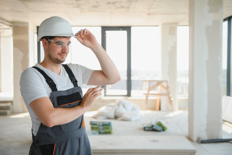 Portrait of Handsome Construction Worker on Building Industry ...