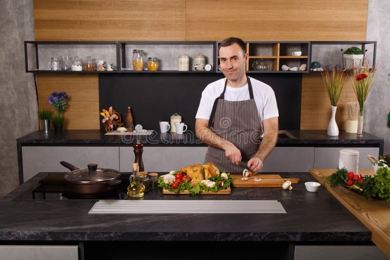 Portrait of handsome cook stock photo. Image of home - 146782664