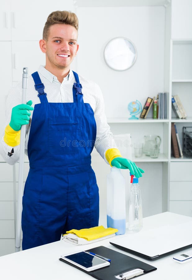 Guy in Uniform Cleaning in Office. Stock Photo - Image of cleaner ...