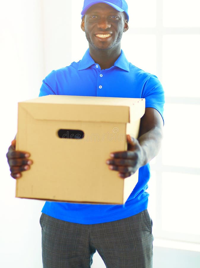 Portrait of an Handsome Happy Deliverer with Box Stock Image - Image of ...