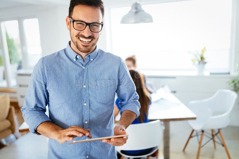 Portrait of Handsome Male Manager Using Digital Tablet Stock Image ...