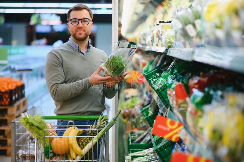 Portrait of Handsome Man Customer in Supermarket Stock Image - Image of ...