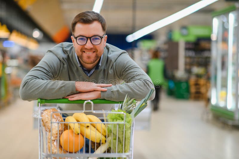 Portrait of Handsome Man Customer in Supermarket Stock Image - Image of ...