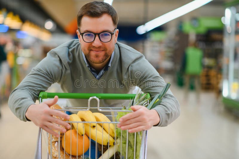 Portrait of Handsome Man Customer in Supermarket Stock Photo - Image of ...