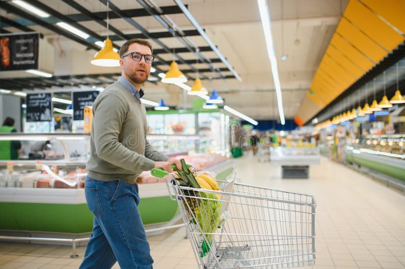 Portrait of Handsome Man Customer in Supermarket Stock Photo - Image of ...