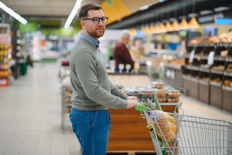 Portrait of Handsome Man Customer in Supermarket Stock Photo - Image of ...