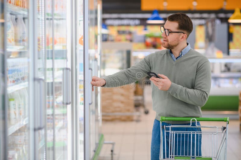 Portrait of Handsome Man Customer in Supermarket Stock Photo - Image of ...