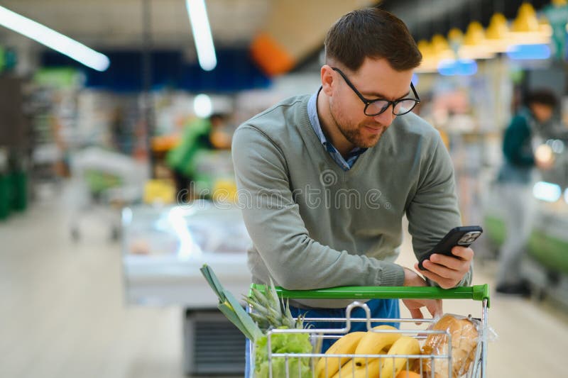 Portrait of Handsome Man Customer in Supermarket Stock Image - Image of ...