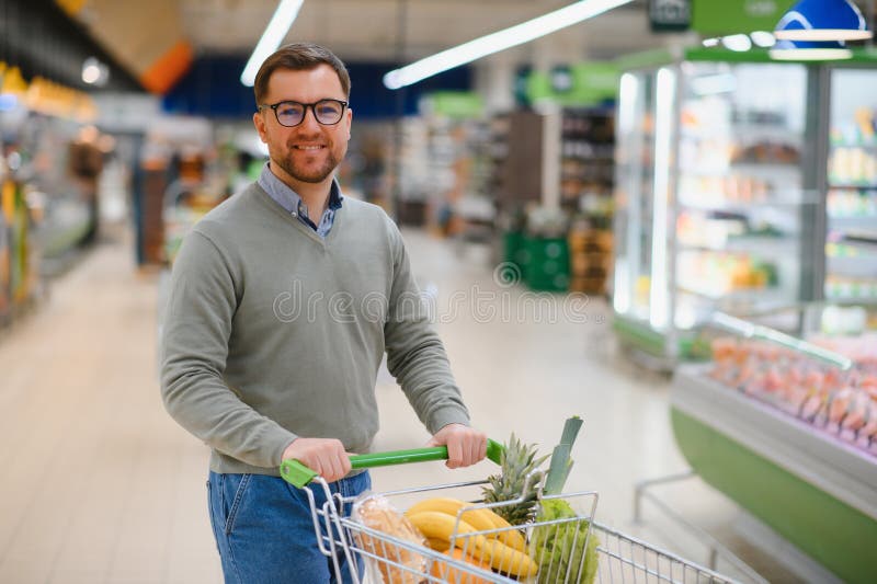 Portrait of Handsome Man Customer in Supermarket Stock Image - Image of ...