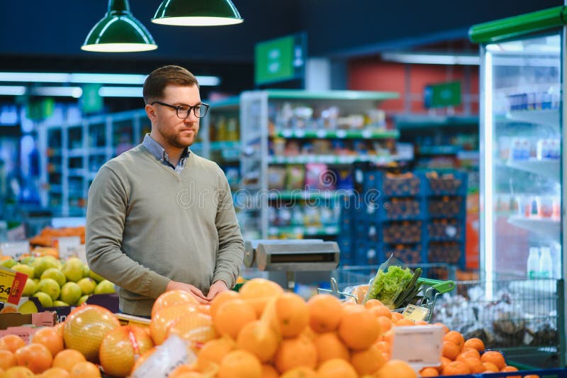 Portrait of Handsome Man Customer in Supermarket Stock Photo - Image of ...