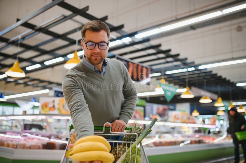 Portrait of Handsome Man Customer in Supermarket Stock Image - Image of ...