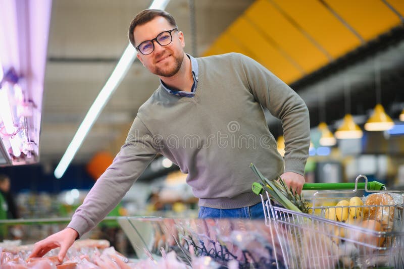 Portrait of Handsome Man Customer in Supermarket Stock Photo - Image of ...