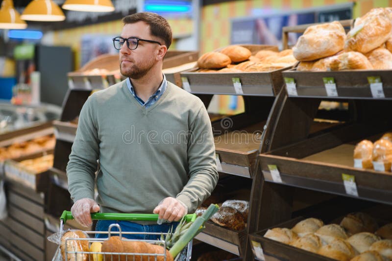 Portrait of Handsome Man Customer in Supermarket Stock Photo - Image of ...
