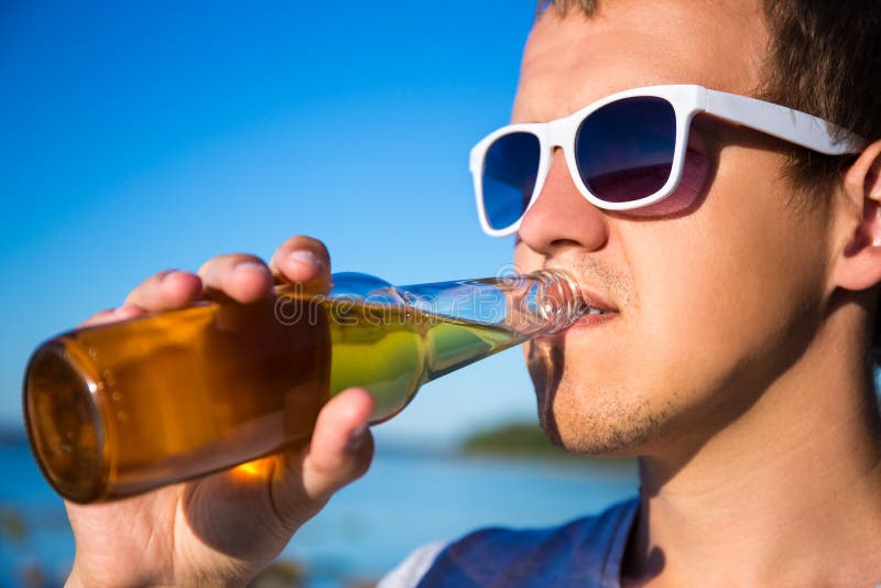 Portrait of Handsome Man Drinking Beer on the Beach Stock Image - Image ...