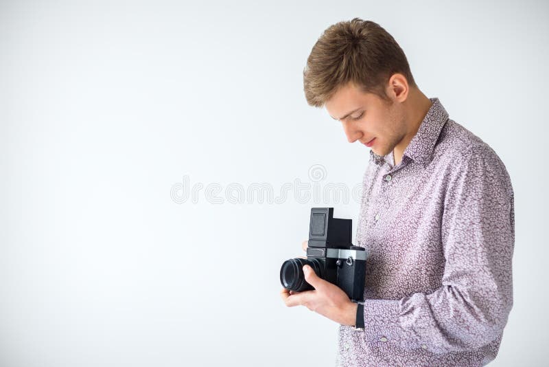 Portrait of Handsome Man with Old Medium Format Camera in Studio Stock ...