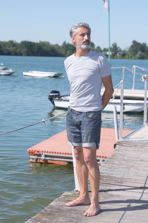 Portrait Handsome Man on Pier Looking Calmly Away Stock Image - Image ...
