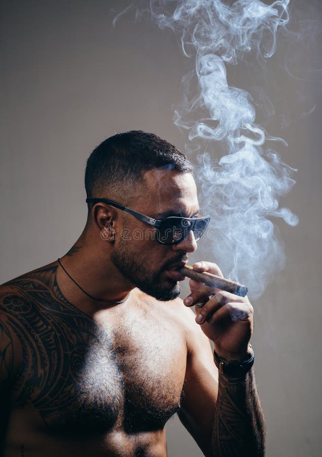 Portrait of Handsome Man with Serious Face Smoking Cigar. Mafia Boss ...