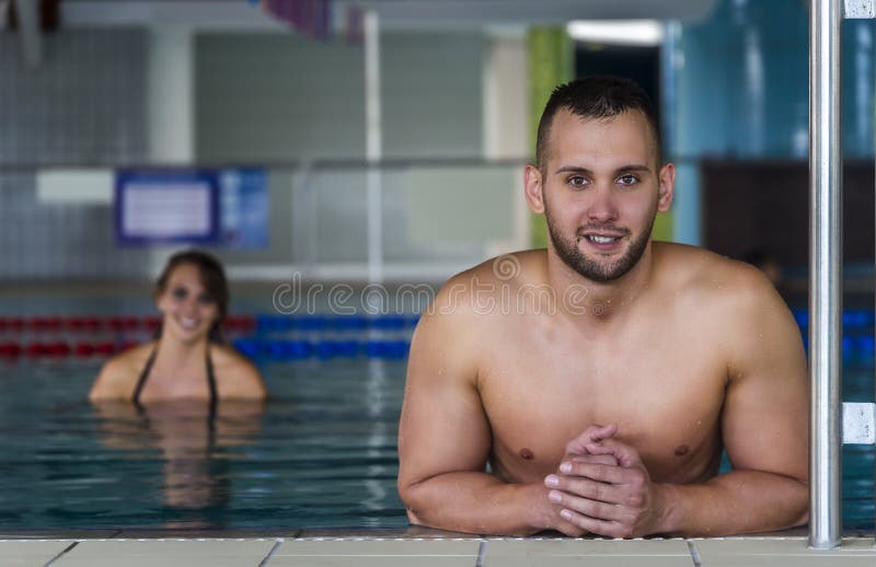 Portrait of Handsome Man in Swimming Pool Stock Image - Image of blue ...