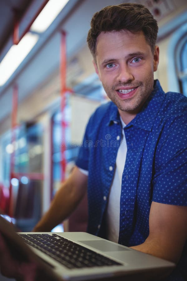 Portrait of Handsome Man Using Laptop in Train Stock Image - Image of ...